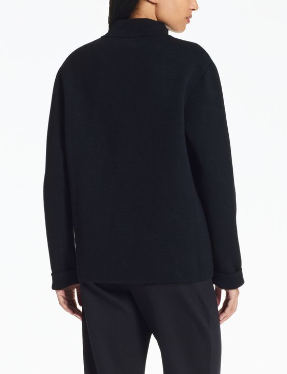 Black gender neutral cardigan – bold knit by Sarah Pacini