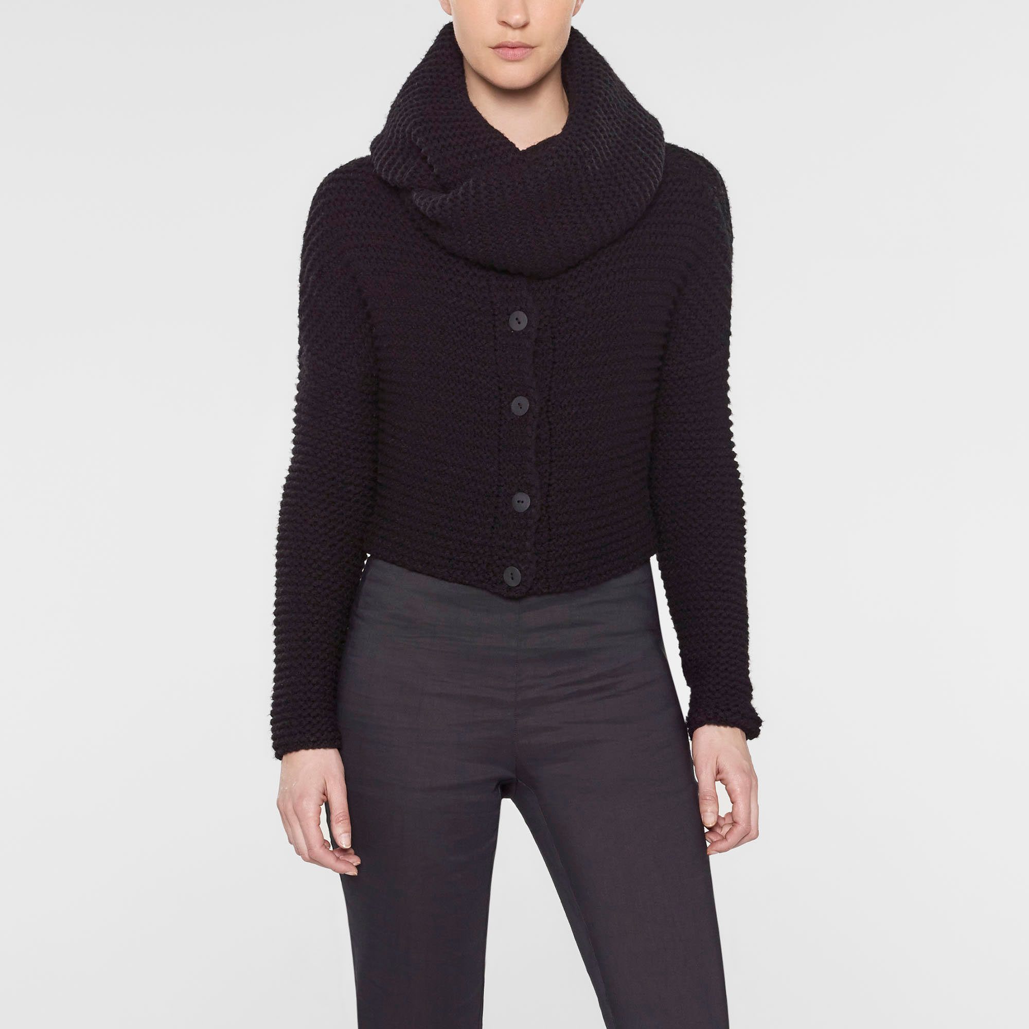 Black wool shawl neck short cardigan by Sarah Pacini