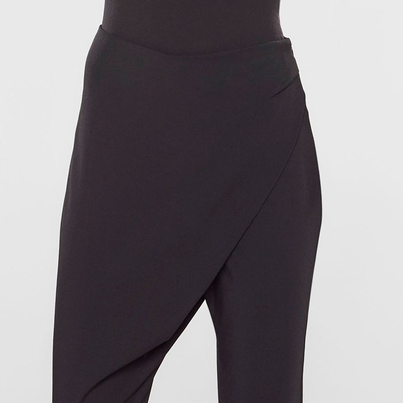 Black wool asymmetrical pants by Sarah Pacini