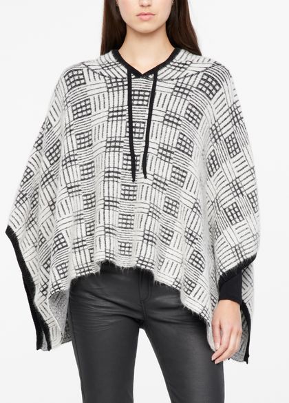 Buy your women's ponchos online at Sarah Pacini